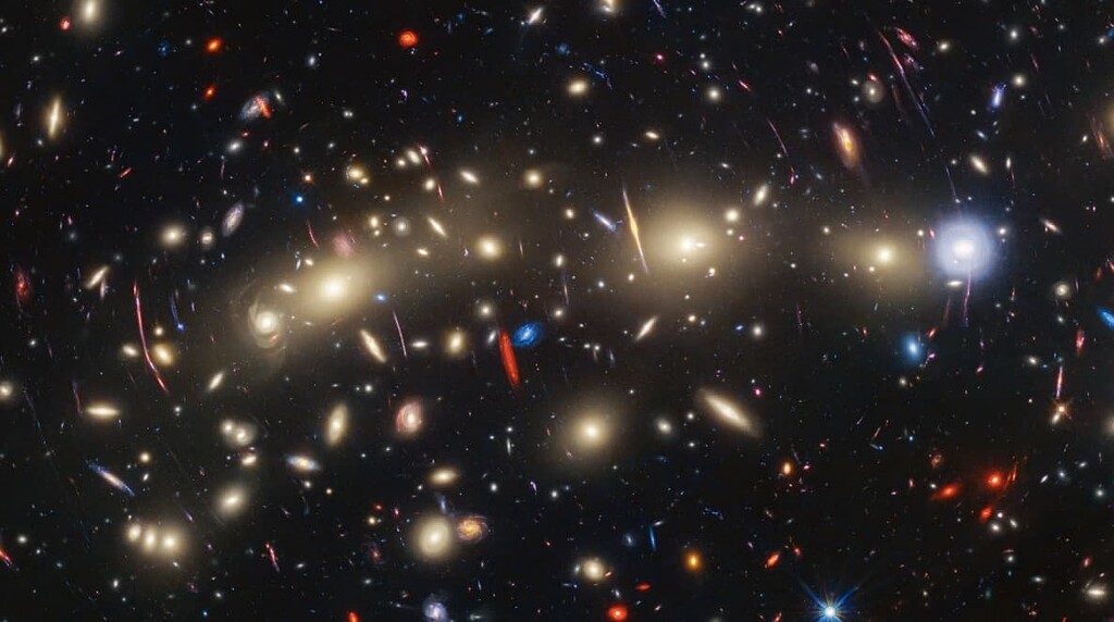 Hubble and JWST Images Combined for Glorious Lensing Capture ...