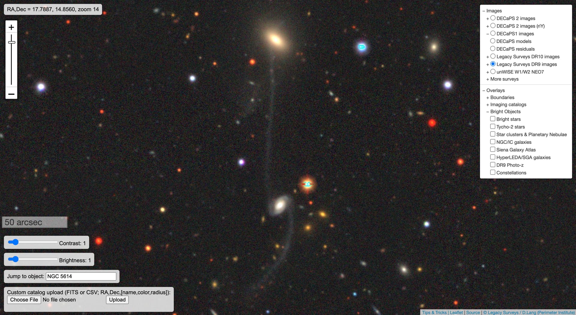 One of the biggest spiral arms created by this larger galaxy above ...