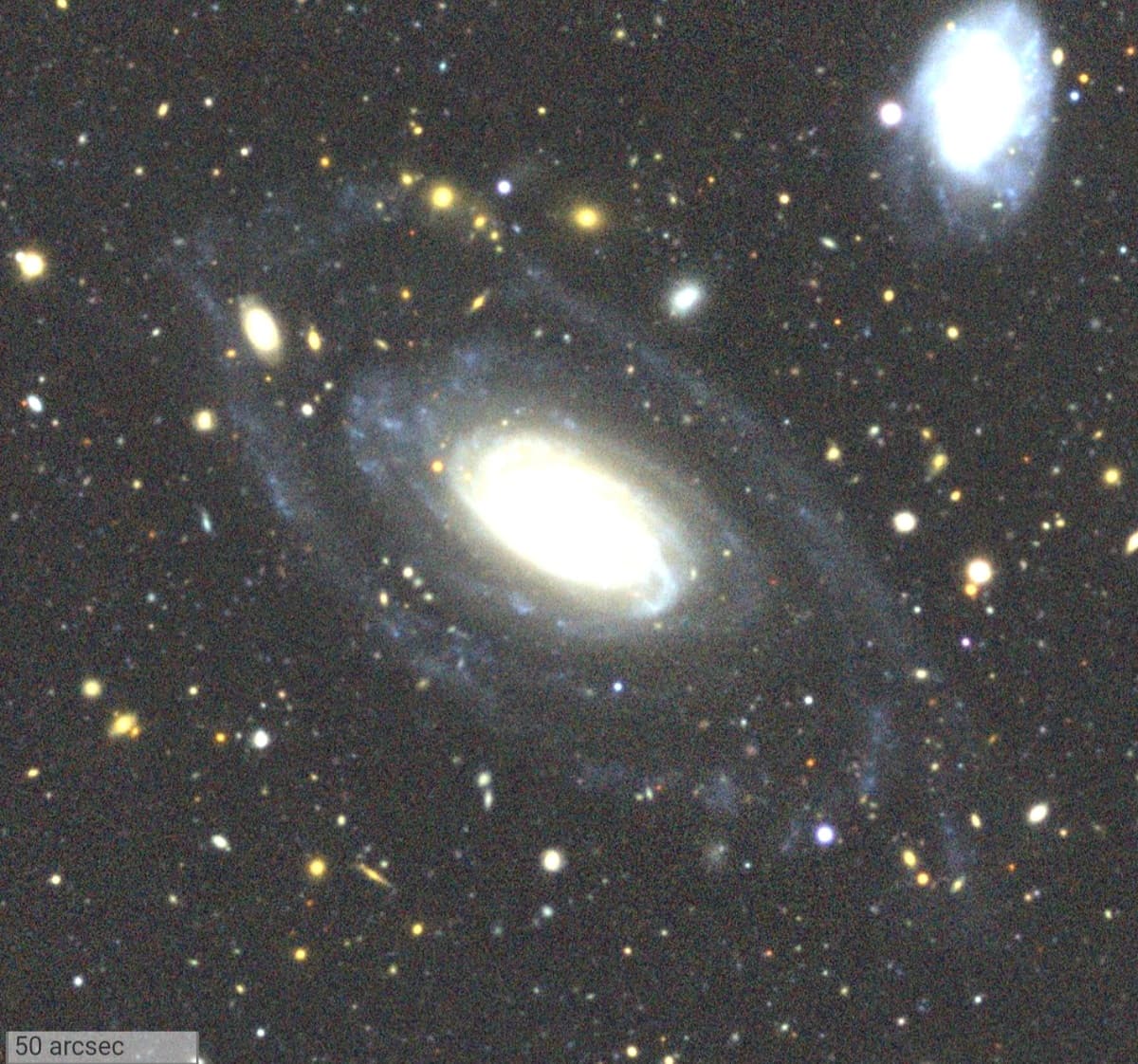 'Extension' of the outer spiral arms creates a circular-ish ...